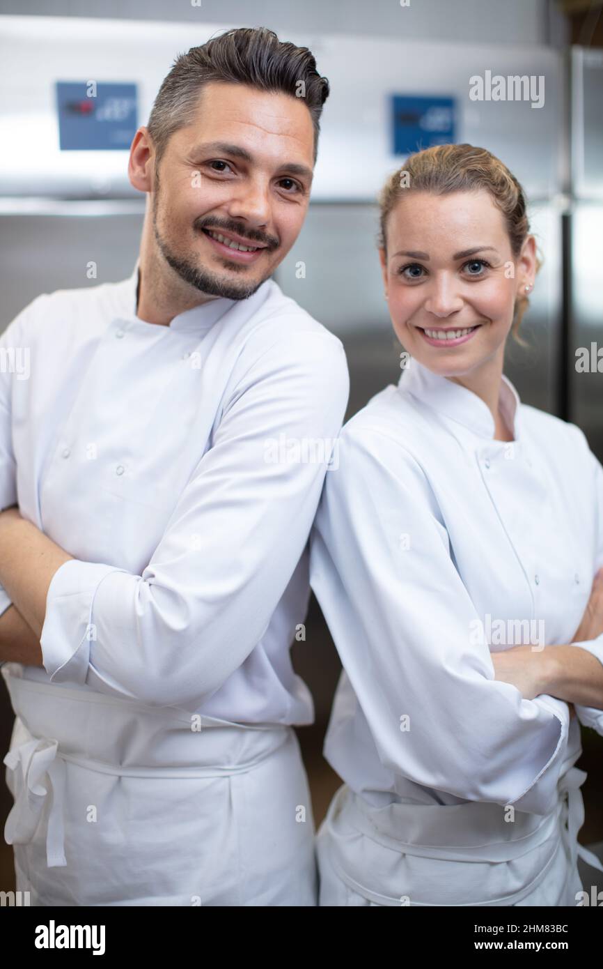 chefs are posing on the camera Stock Photo - Alamy
