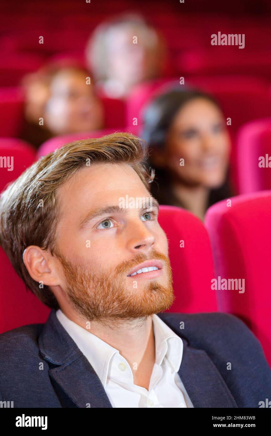 Man sitting in empty cinema hi-res stock photography and images - Alamy