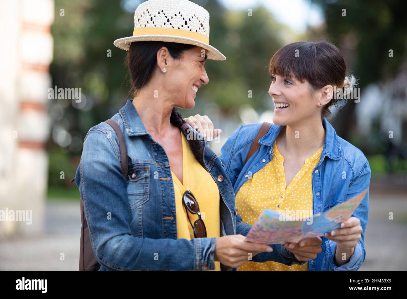 Group young tourists lost looking hi-res stock photography and images ...