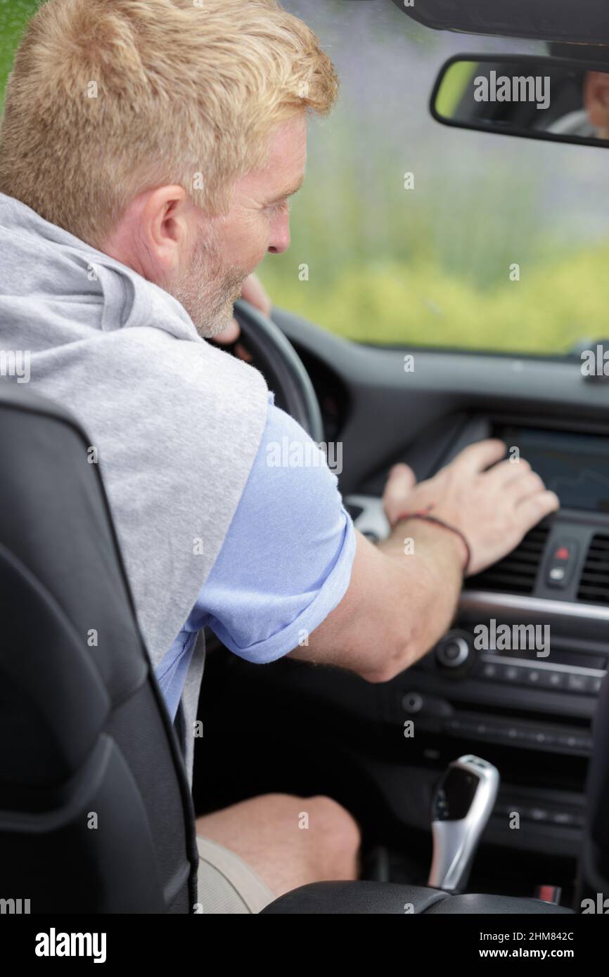 a man changing a dashboard Stock Photo - Alamy