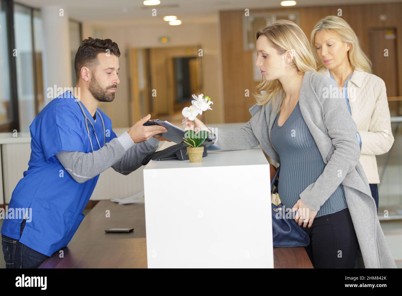 Male medical assistant hi-res stock photography and images - Alamy