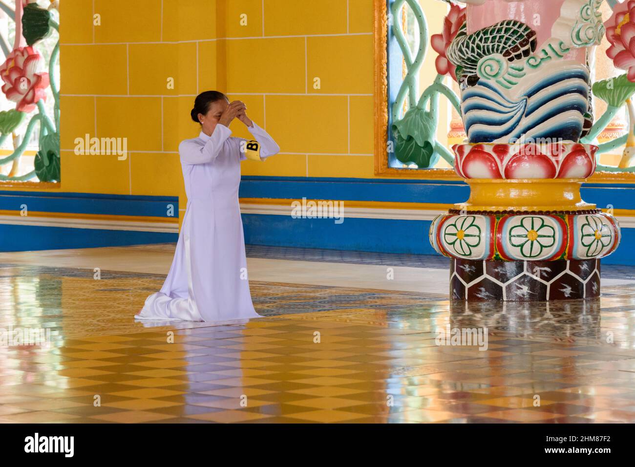 Caodaist worshipper at the Cao Dai Temple, Long Than village, Tay Ninh ...