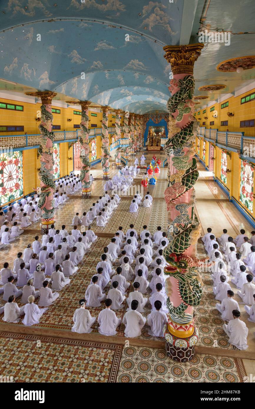 Caodaist worshippers at the Cao Dai Temple, Long Than village, Tay Ninh ...