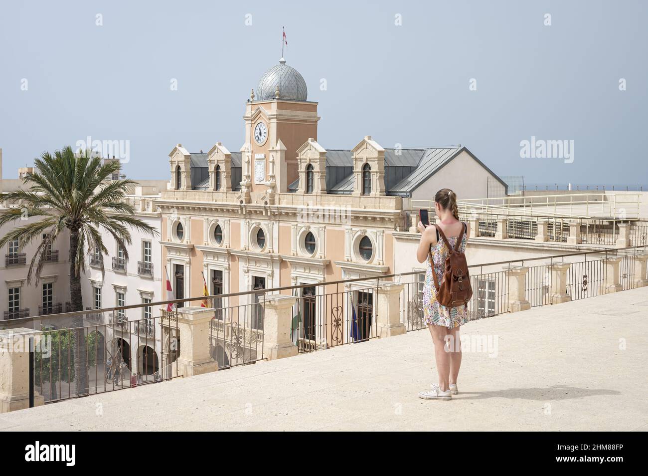 Caucasian Victoria Reina Rodriguez filming and taking pictures of the ...