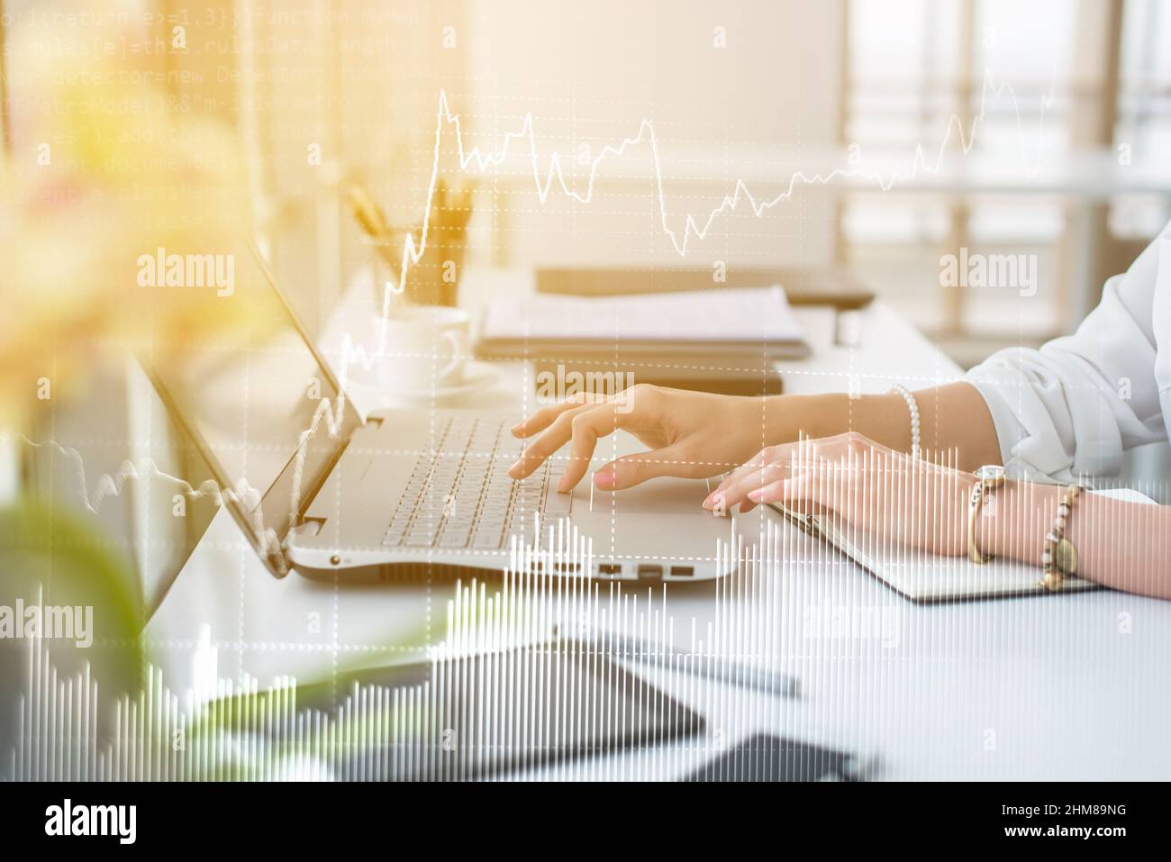 Close-up photo of female hands with accessories working on portable ...