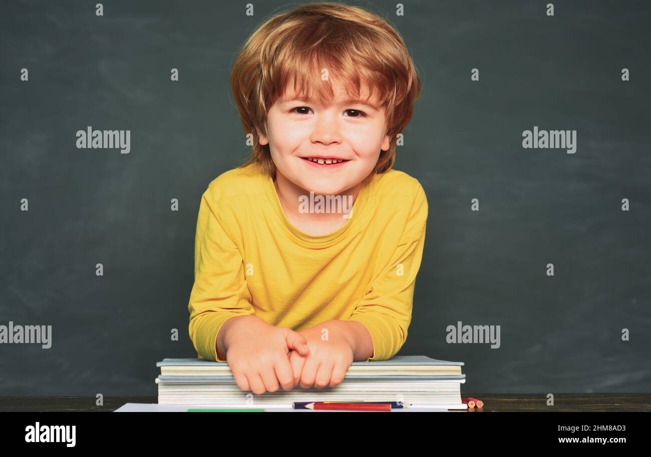 Teachers day. Cute little preschool kid boy in a classroom. Happy ...
