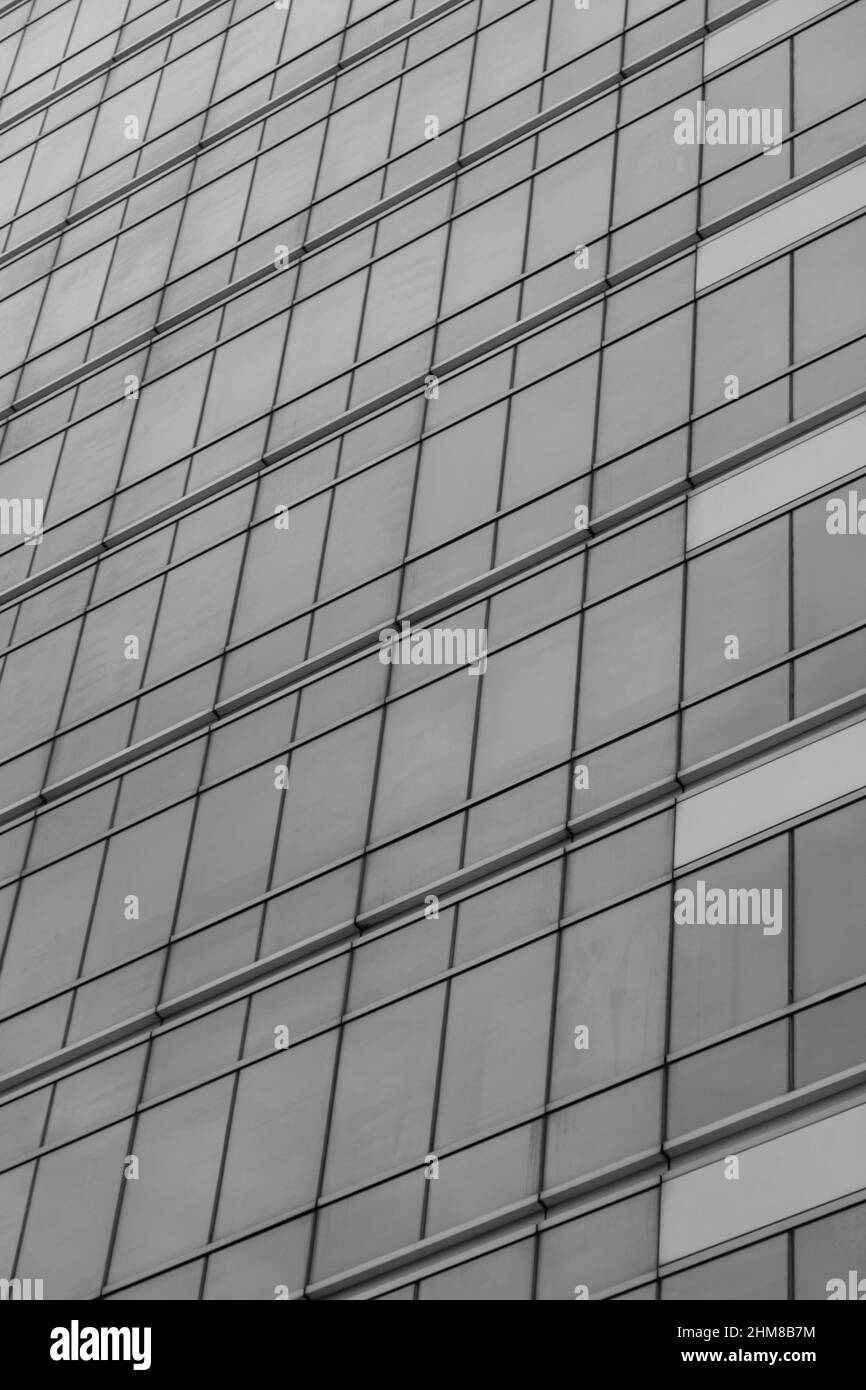 Modern office building windows use for background Stock Photo - Alamy