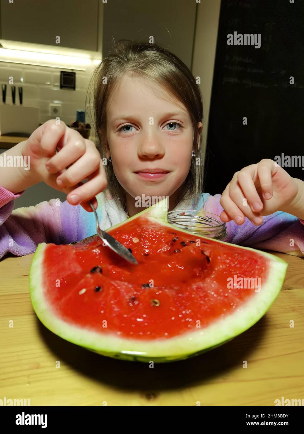 happy cute smiling little girl eating watermelon Stock Photo - Alamy