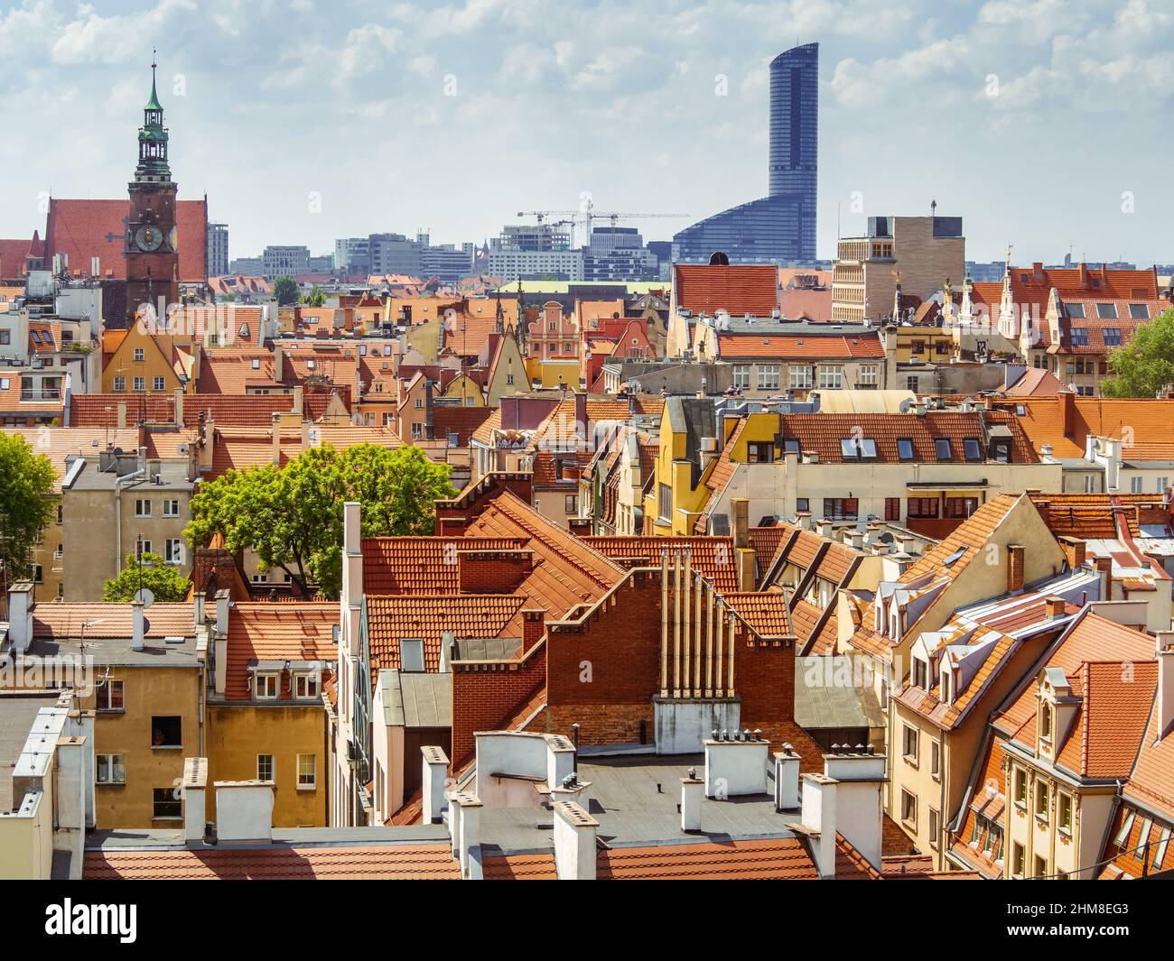 view from above on orange tiled rooftops of old medieval buildings of ...