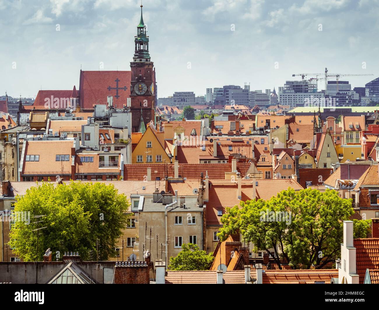 view from above on orange tiled rooftops of old medieval buildings of ...