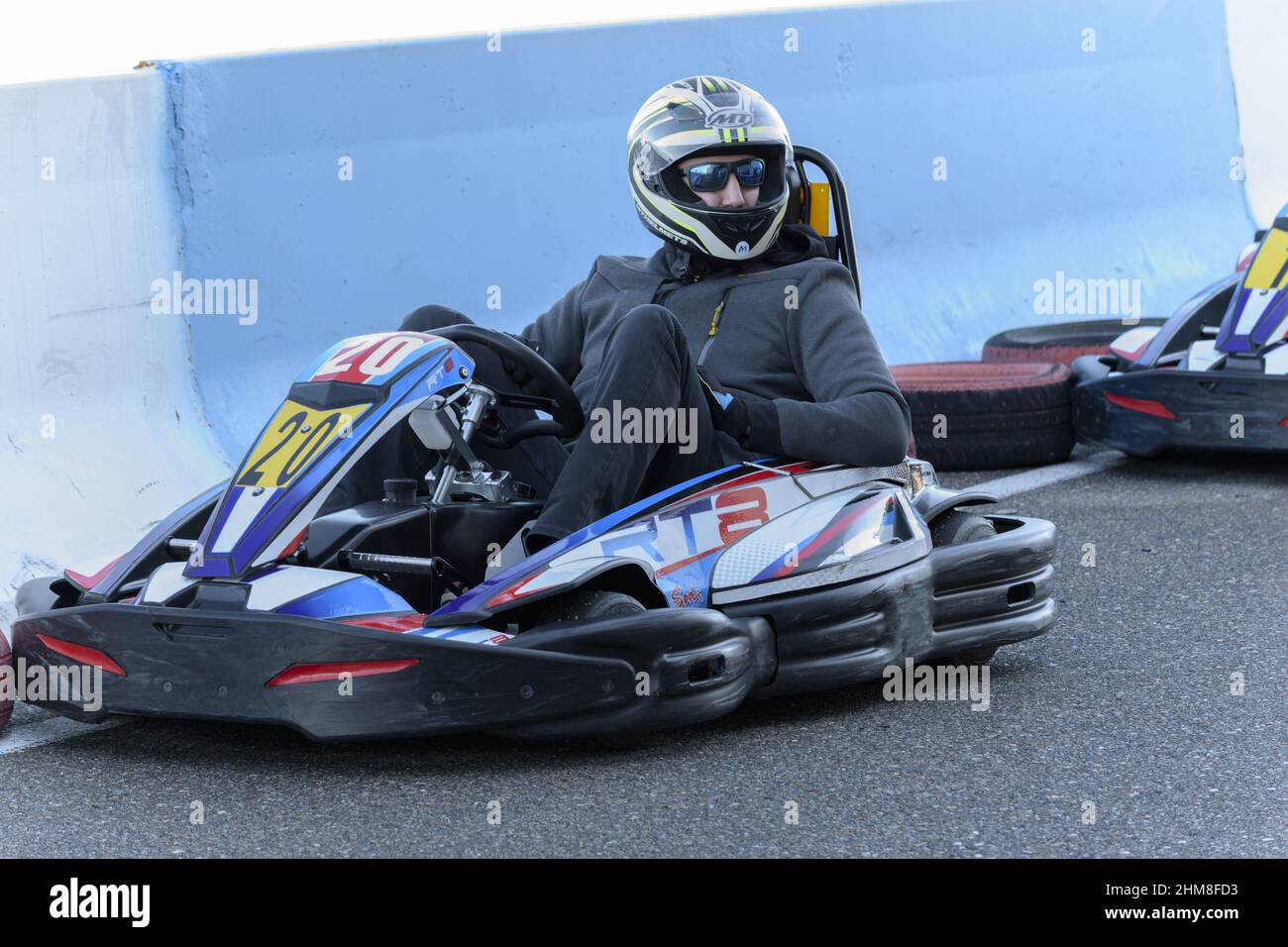 Man in pits ready for Go-carts race on karting track Stock Photo - Alamy