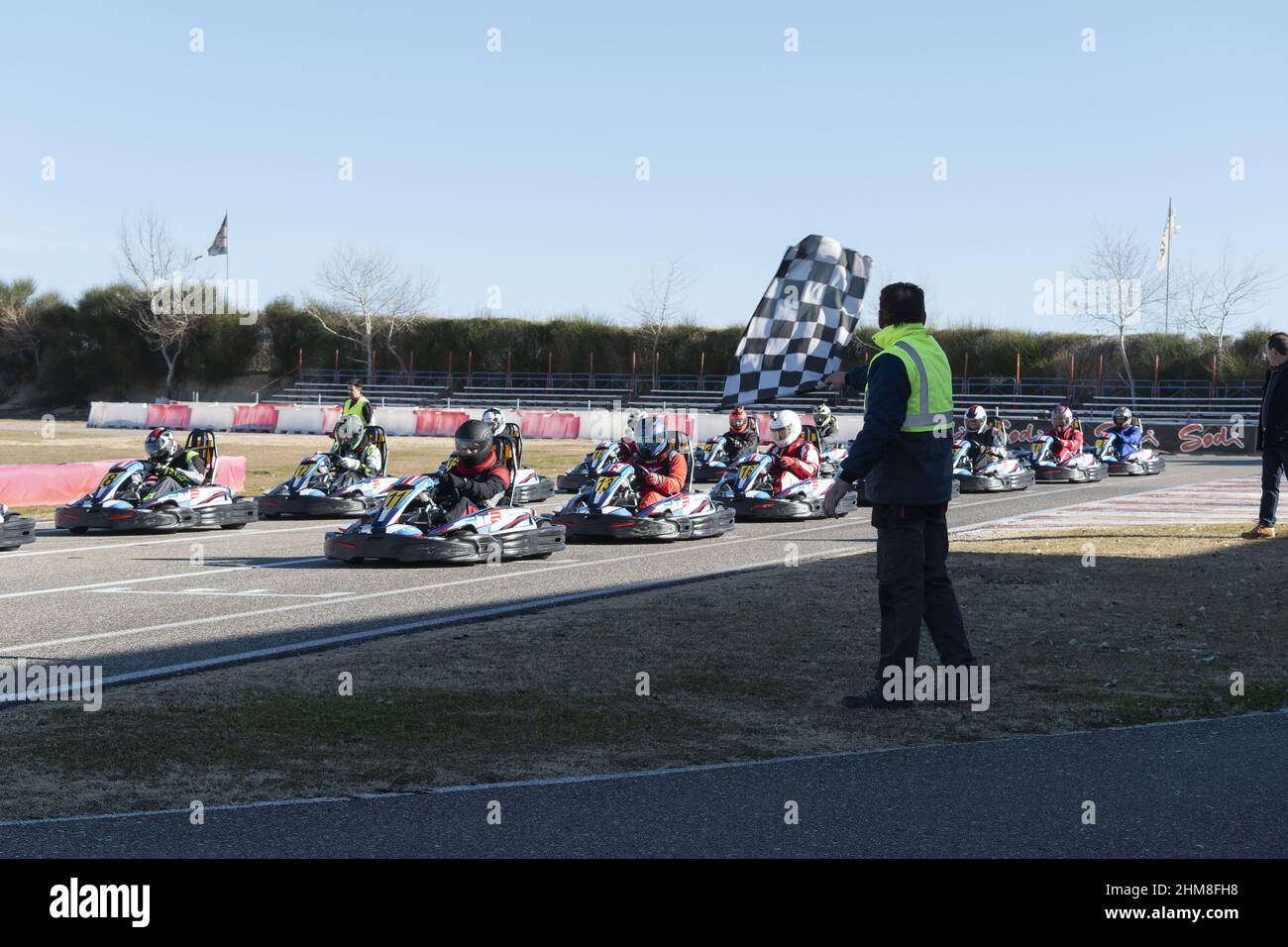 Start from the finish line of men racing with Go-cart Stock Photo - Alamy