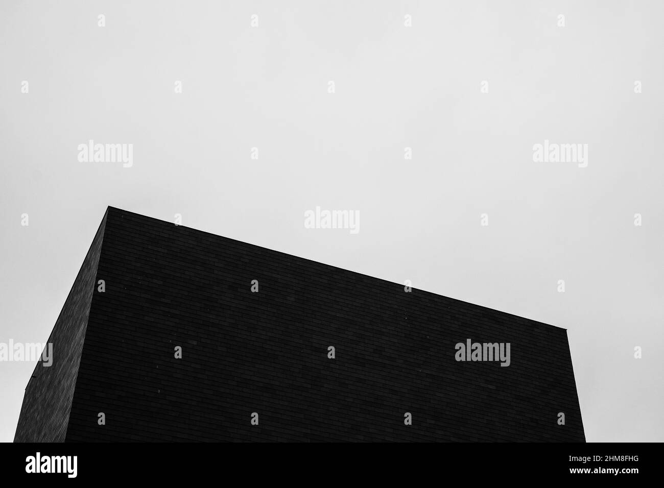 Grayscale of an industrial brick building Stock Photo - Alamy