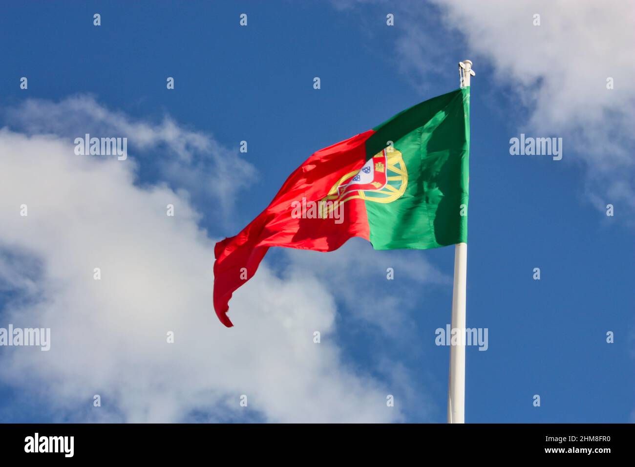 Portugal flag isolated on sky background. close up waving flag of ...