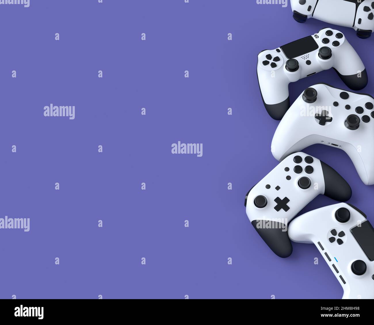Set of lying gamer joysticks or gamepads on purple background with blur ...