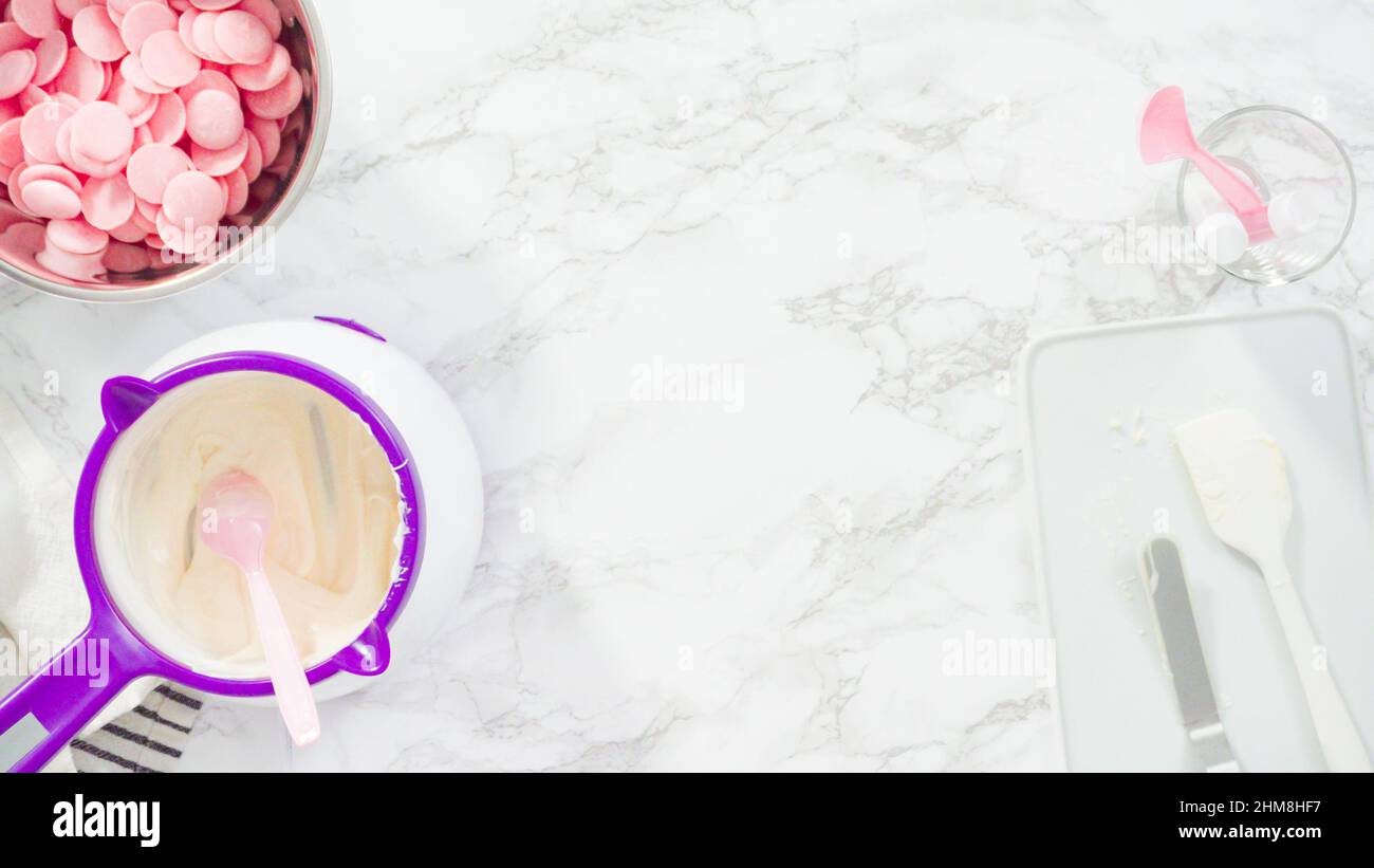 Flat lay. Step by step. Melting chocolate candy melts in an electric ...