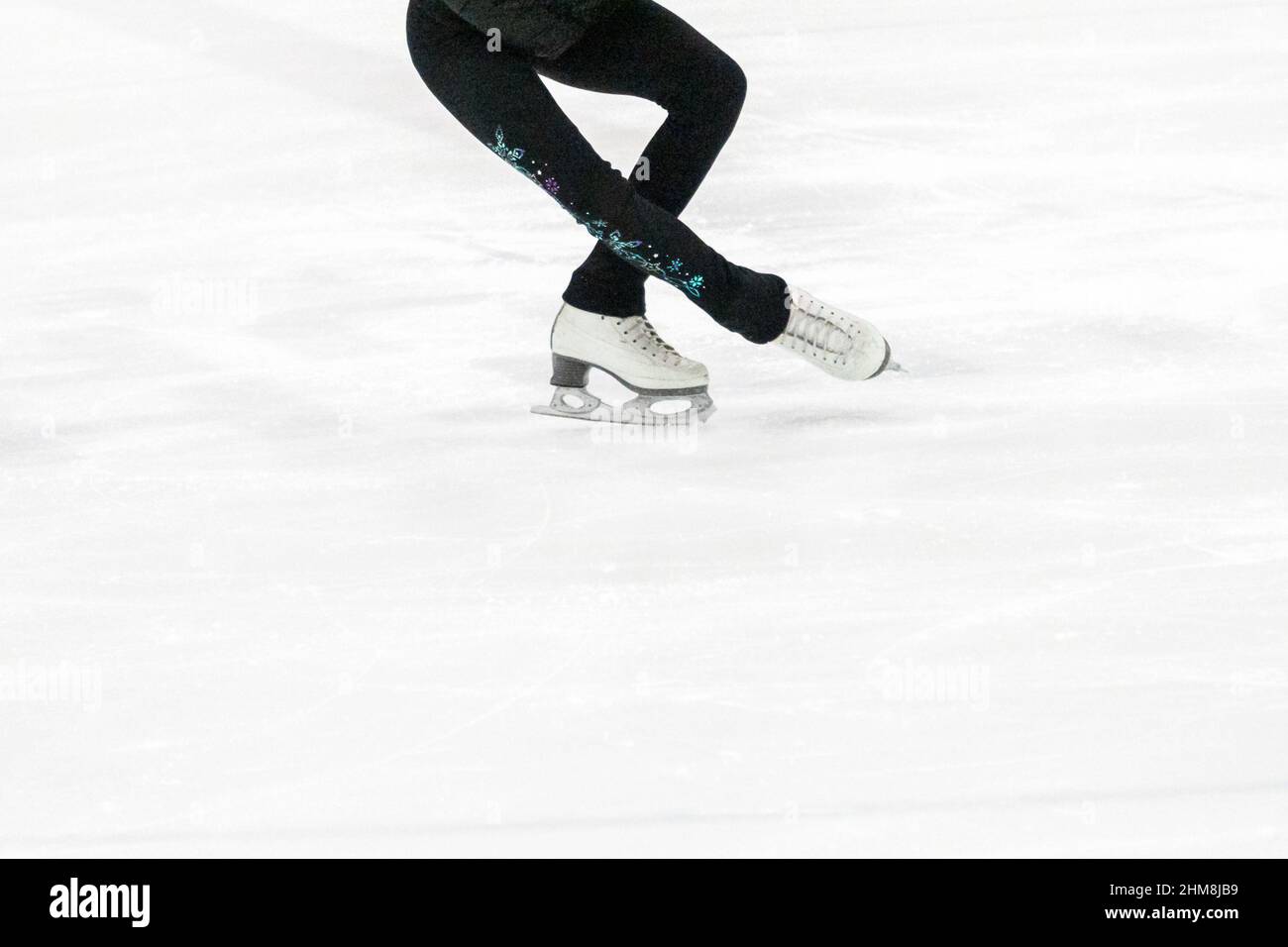 View of figure skater feet at the figure skating practice Stock Photo ...