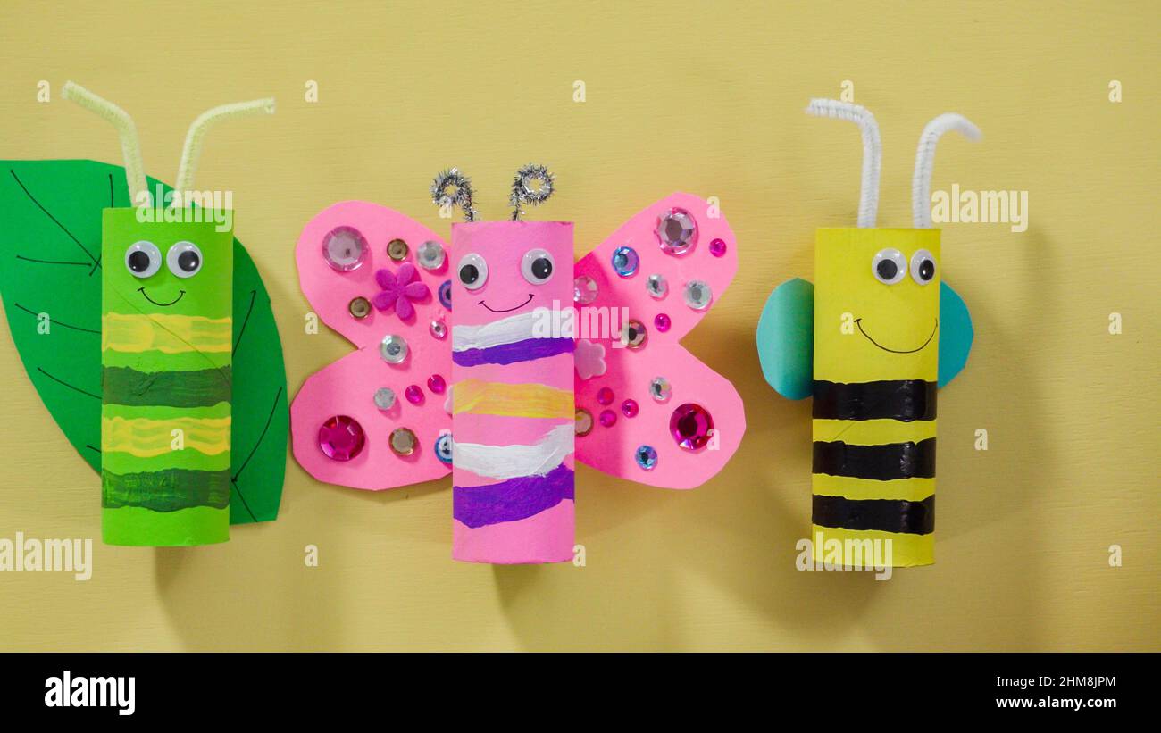 Flat lay. Papercraft project. Colorful bugs made out of empty toilet ...