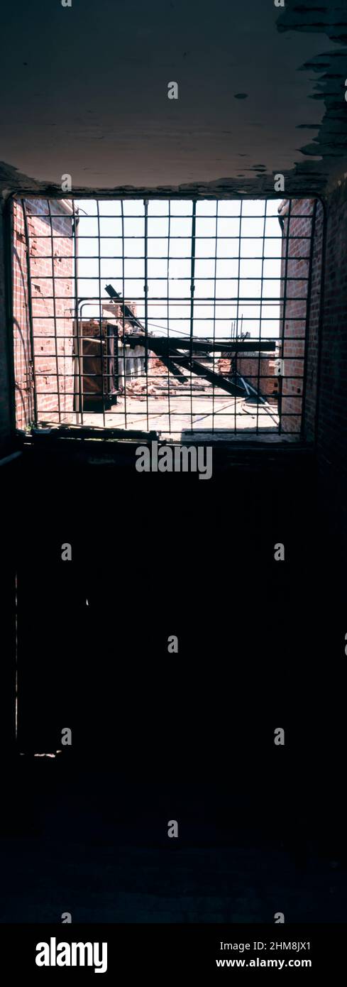 Closed gate leading to compound at Gyaros prison. The prison was used ...