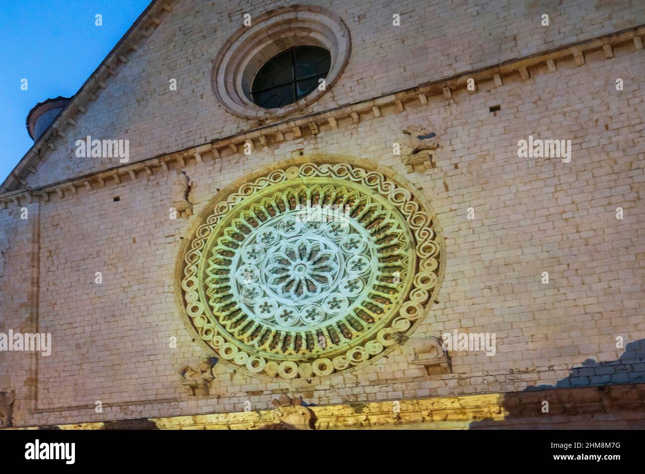 Illuminated rose window of the Basilica of San Francesco, Assisi ...