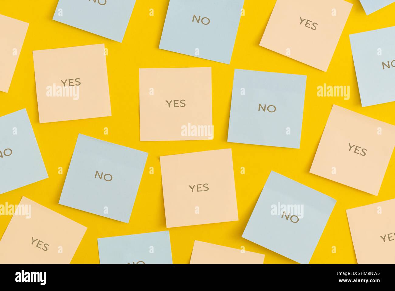 Mock up colored sticky notes on yellow background. Yes or No. Business ...