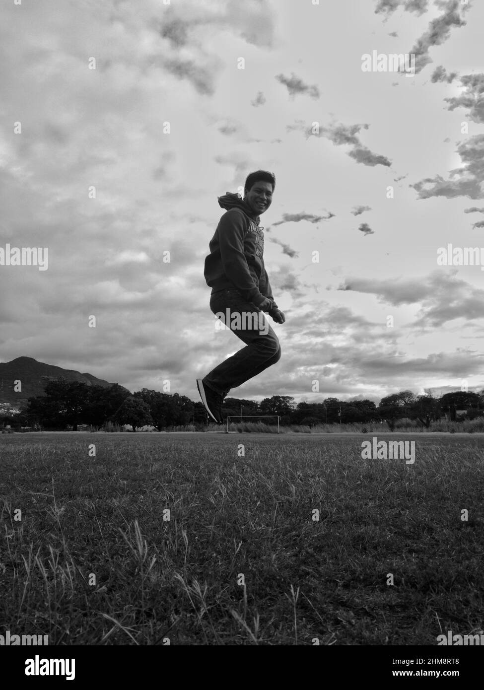 A man jumping in the air Stock Photo - Alamy