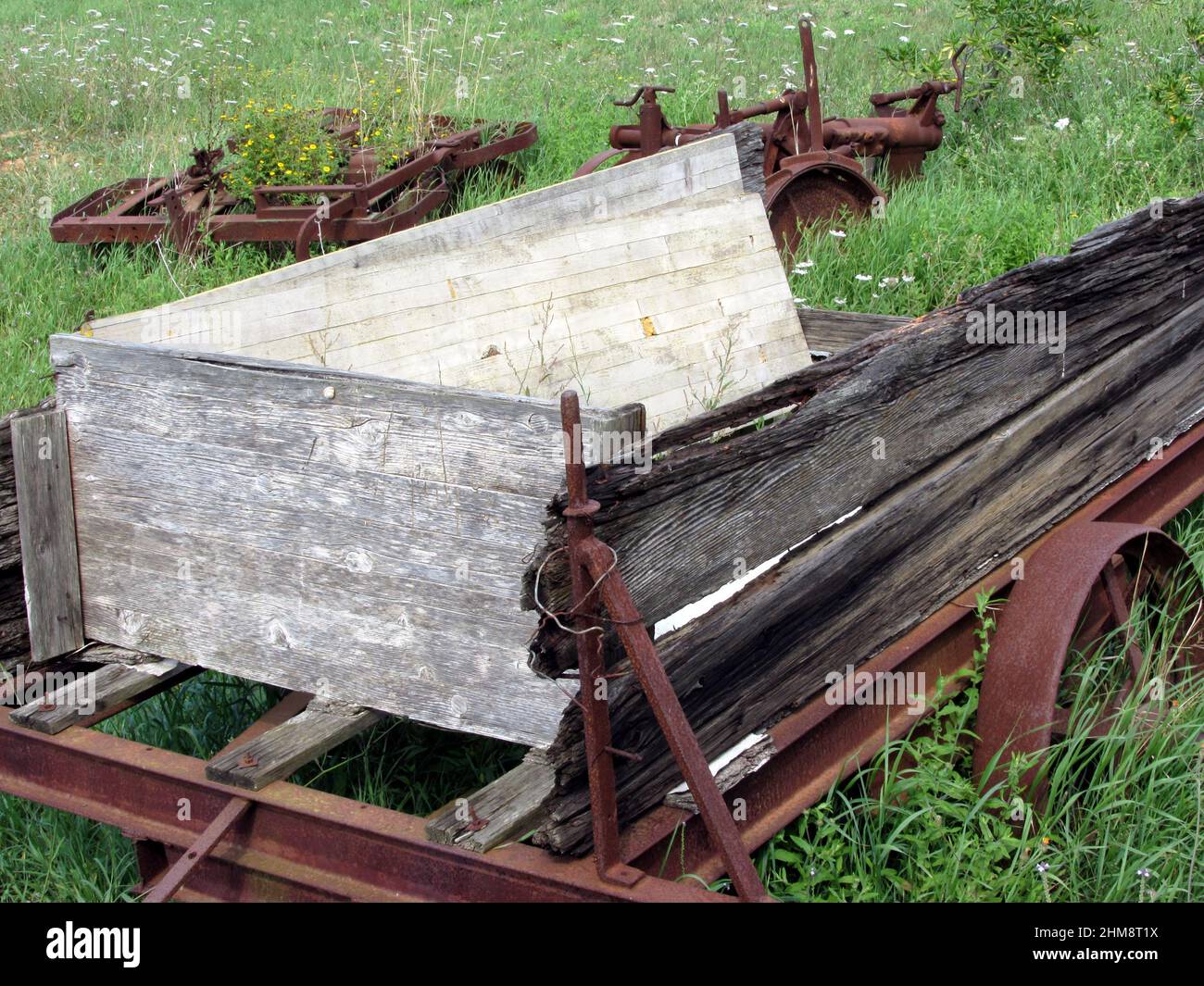 Old rusty cart in the garde Stock Photo - Alamy