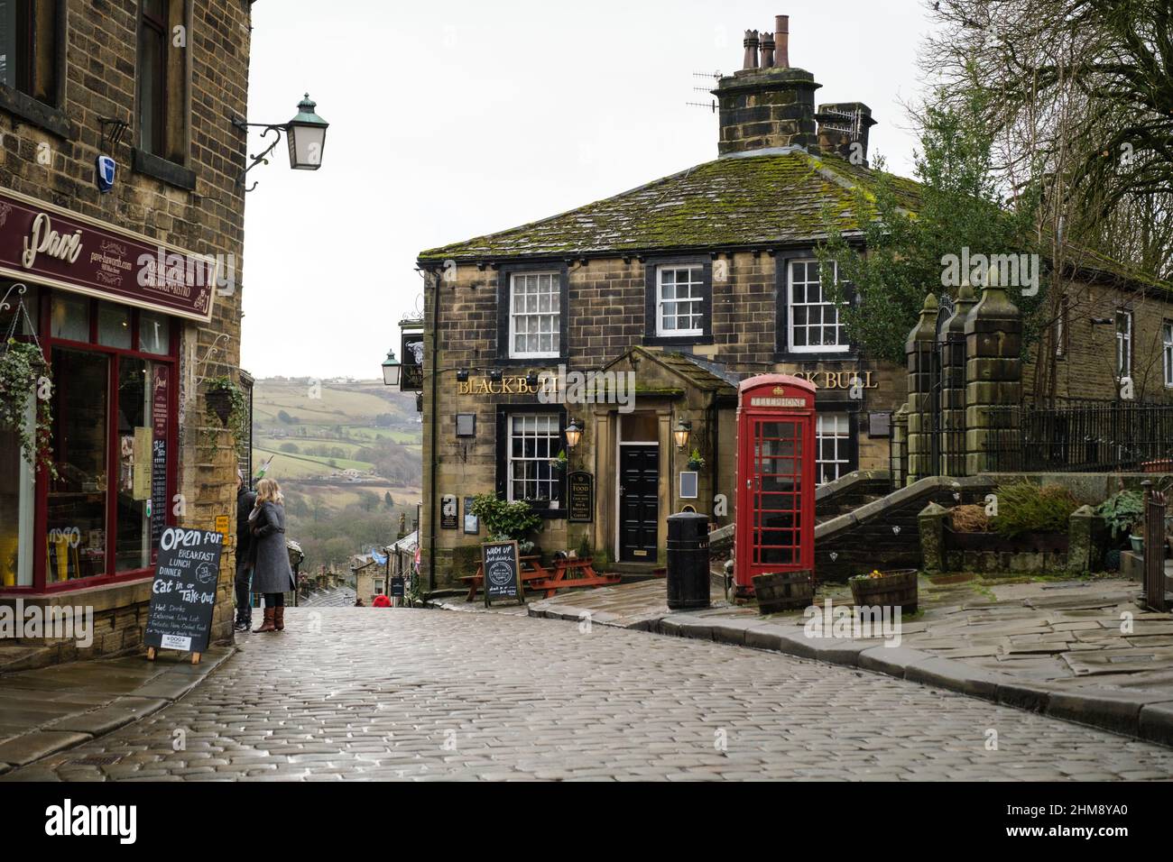 Haworth, UK: Main Street in Howarth, West Yorkshire attracts tourists ...