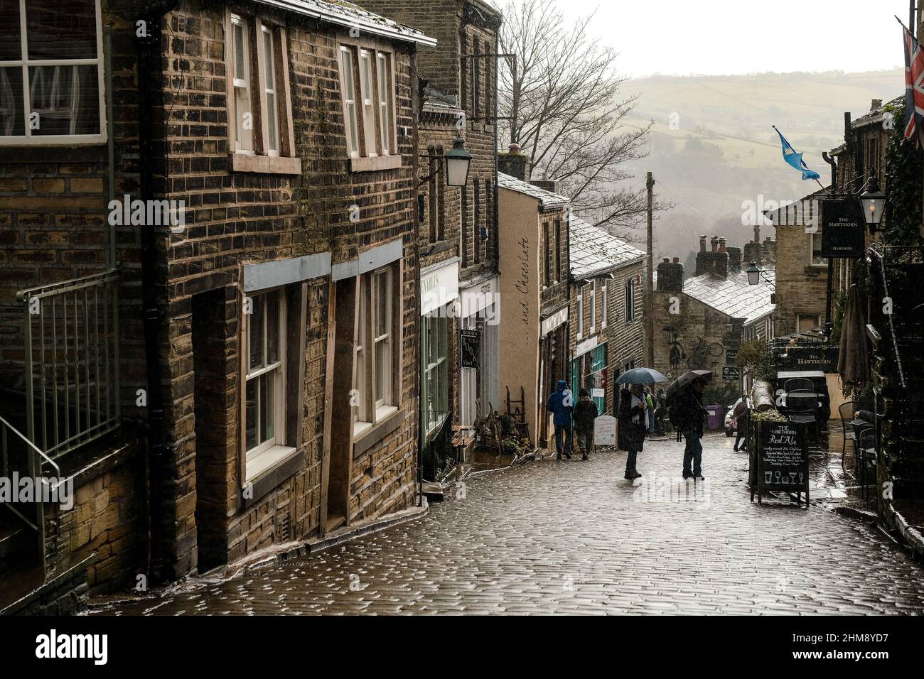 Haworth, UK: Main Street in Howarth, West Yorkshire attracts tourists ...