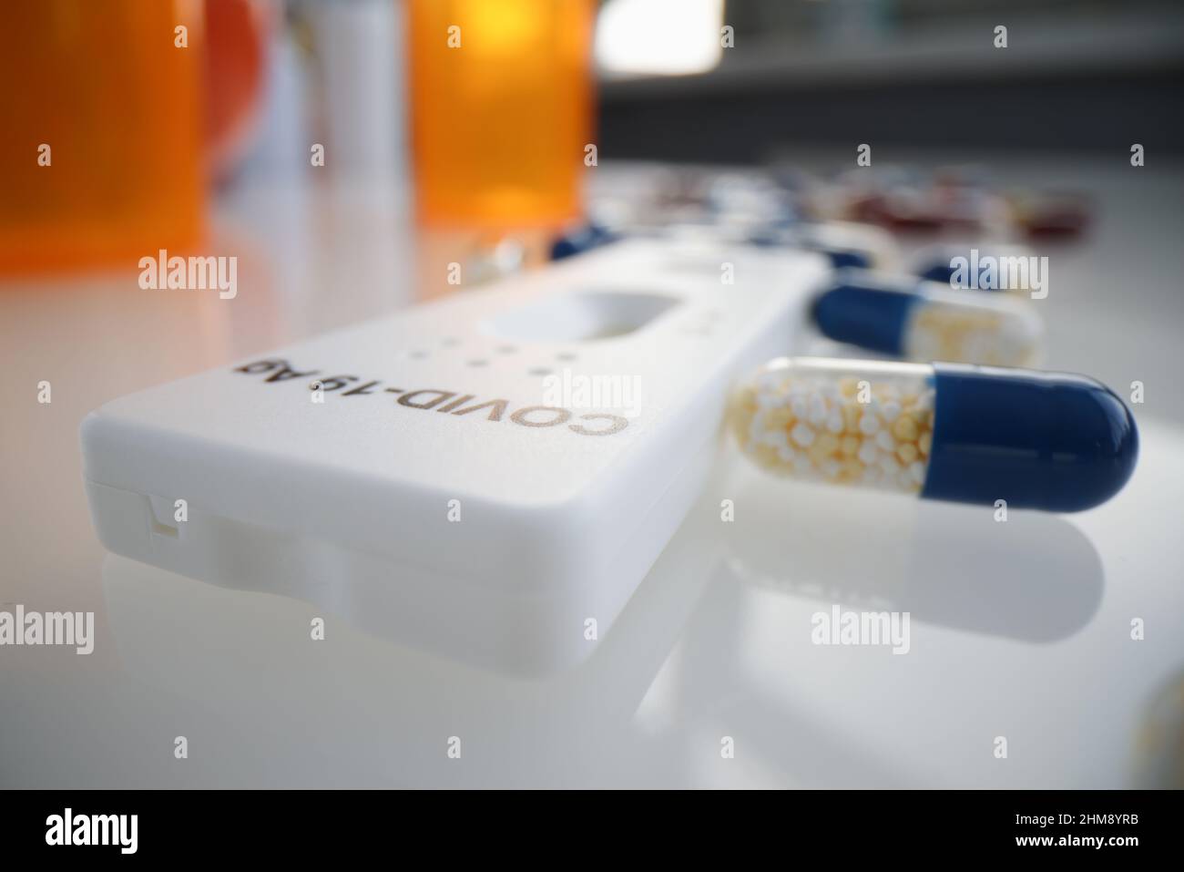 Express test for covid 19 antigen lying among many medical capsules ...