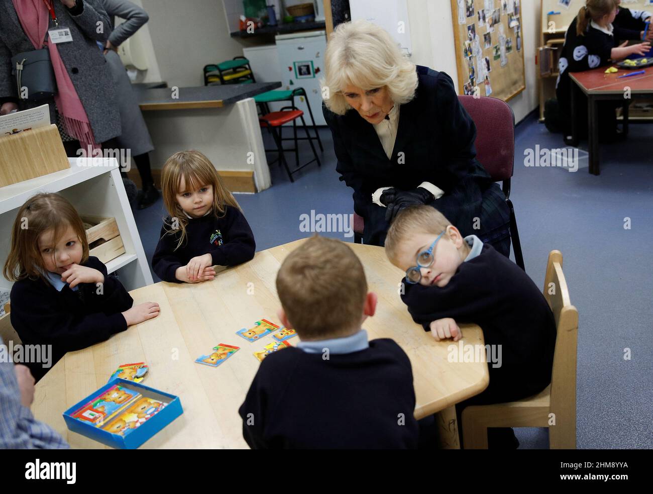The Duchess of Cornwall talks to pupils during a visit to Roundhill ...
