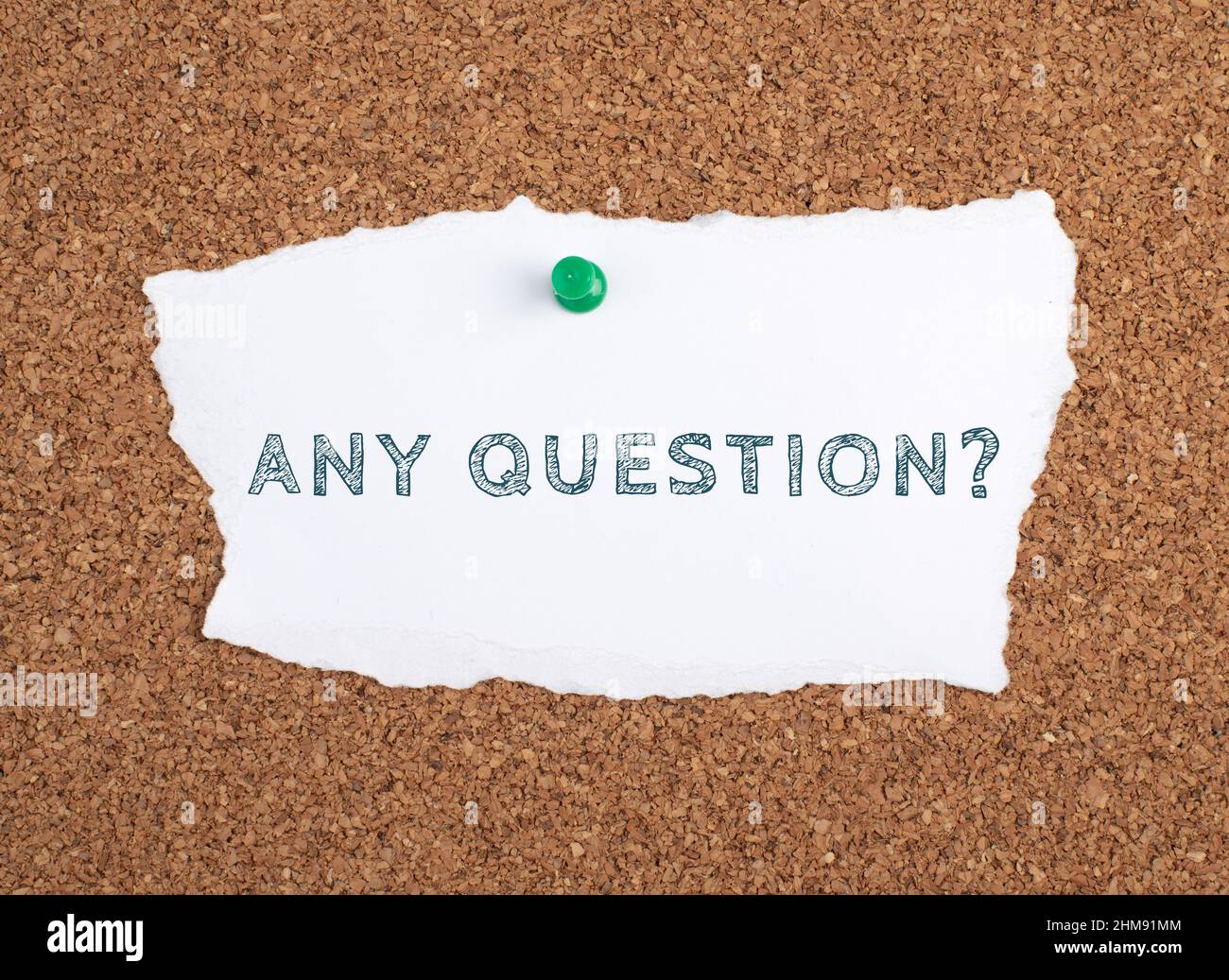 The words any question are written on a piece of paper, education and ...