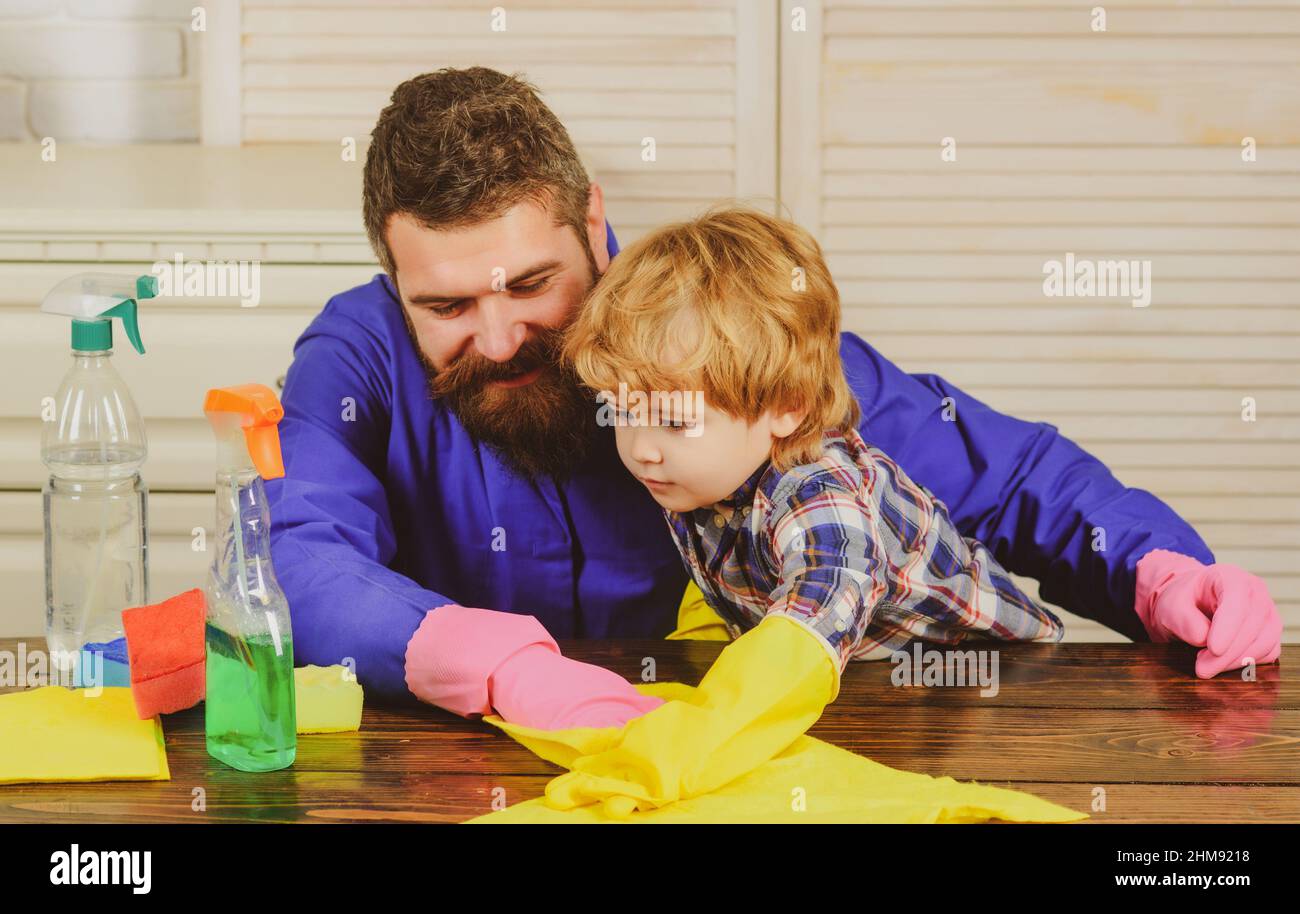 Father and son cleaning. Man accustoms the boy to cleanliness Stock ...