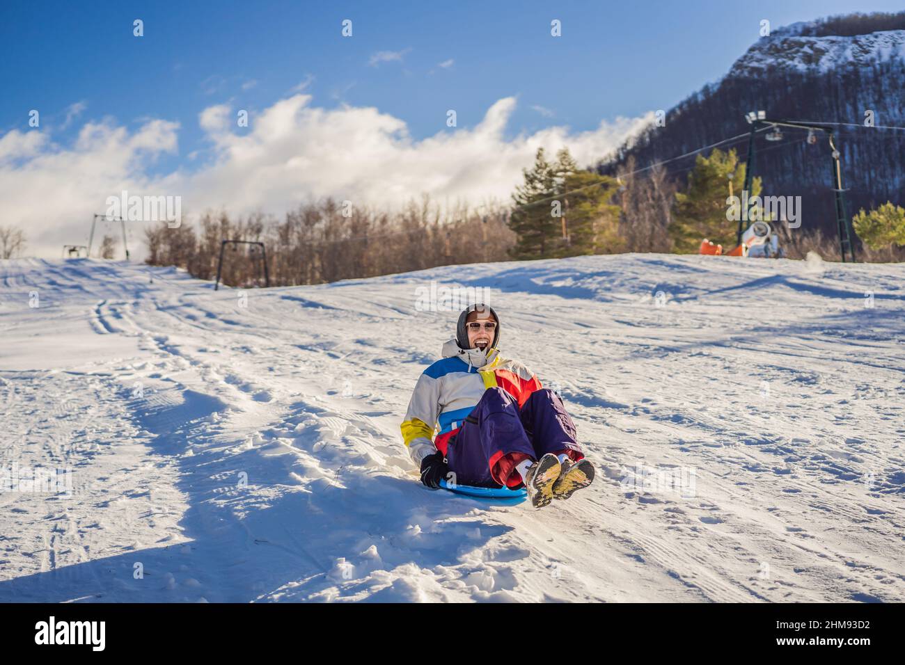 People sledding sliding down hi-res stock photography and images - Alamy