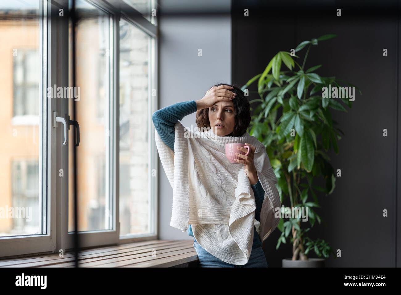 Unhappy girl feeling sick suffer from fever headache, high temperature ...