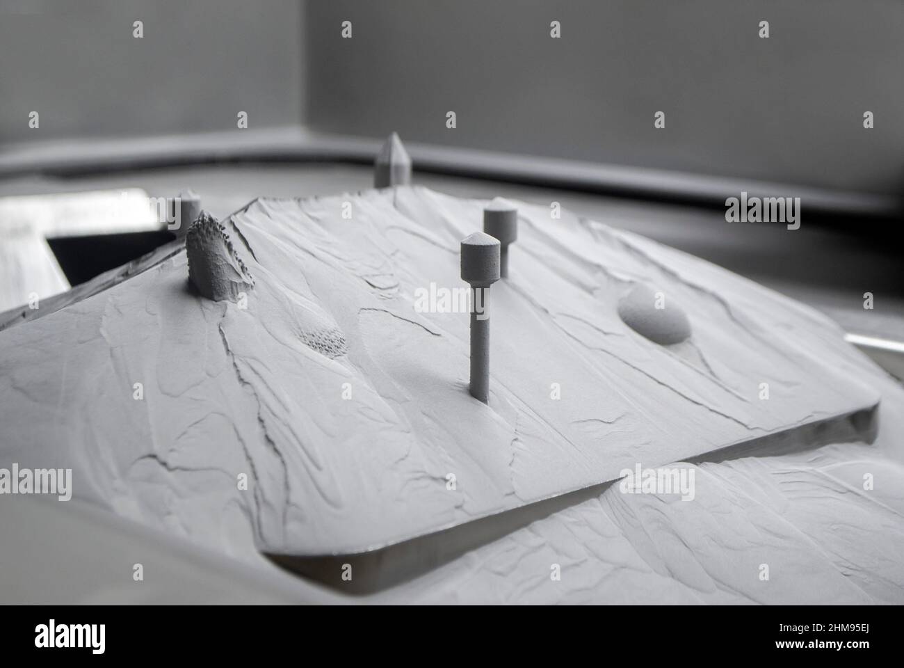 Surface with printed objects on metal 3D printer, covered metal powder ...