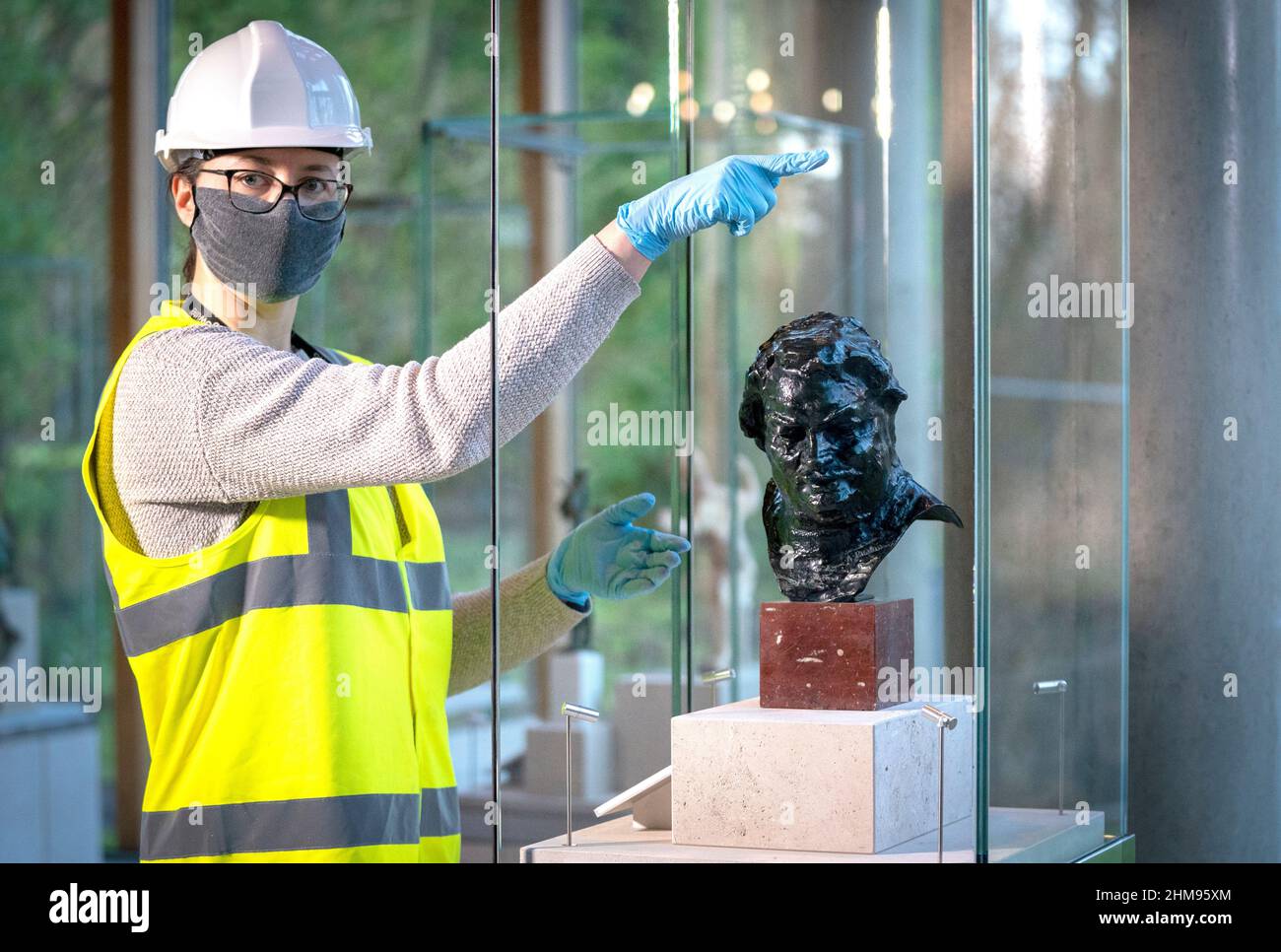 Objects conservator Sophie Philipps handles Balzac, a bronze created ...