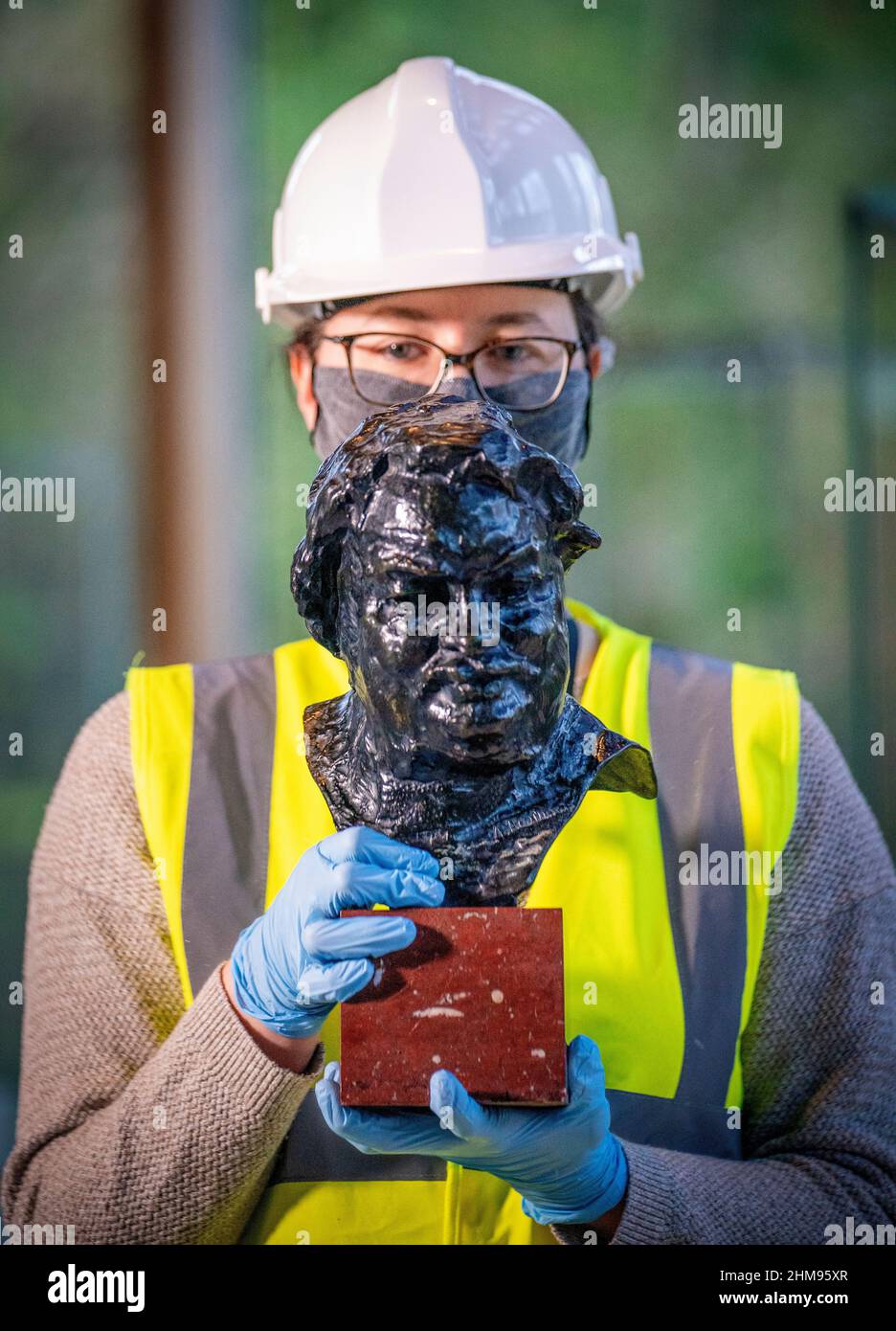 Objects conservator Sophie Philipps handles Balzac, a bronze created ...