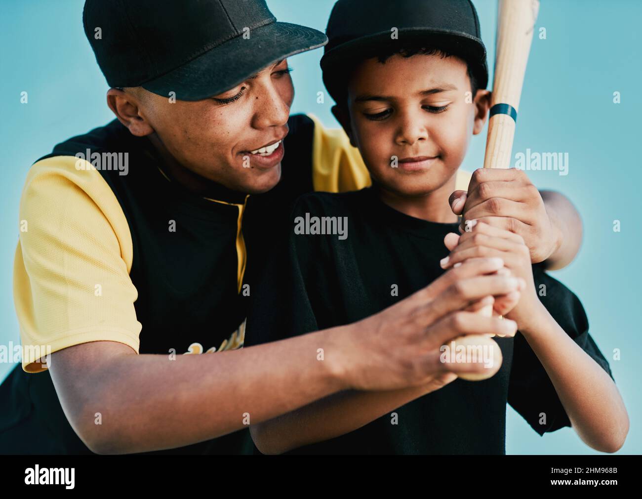 Im training him to be a great player. Shot of a young baseball player ...