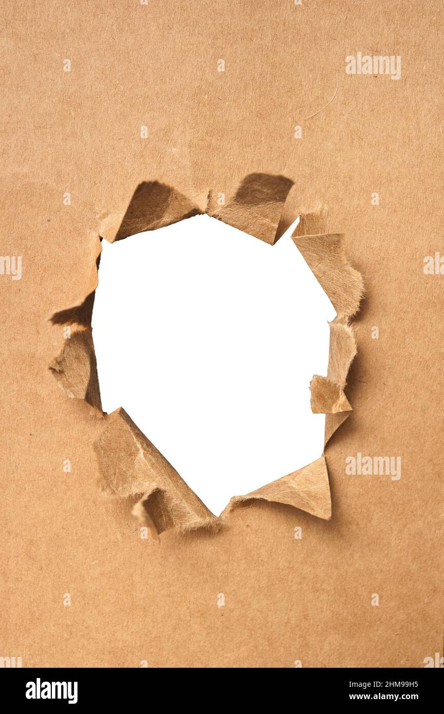 teared brown paper as background and graphic element Stock Photo - Alamy