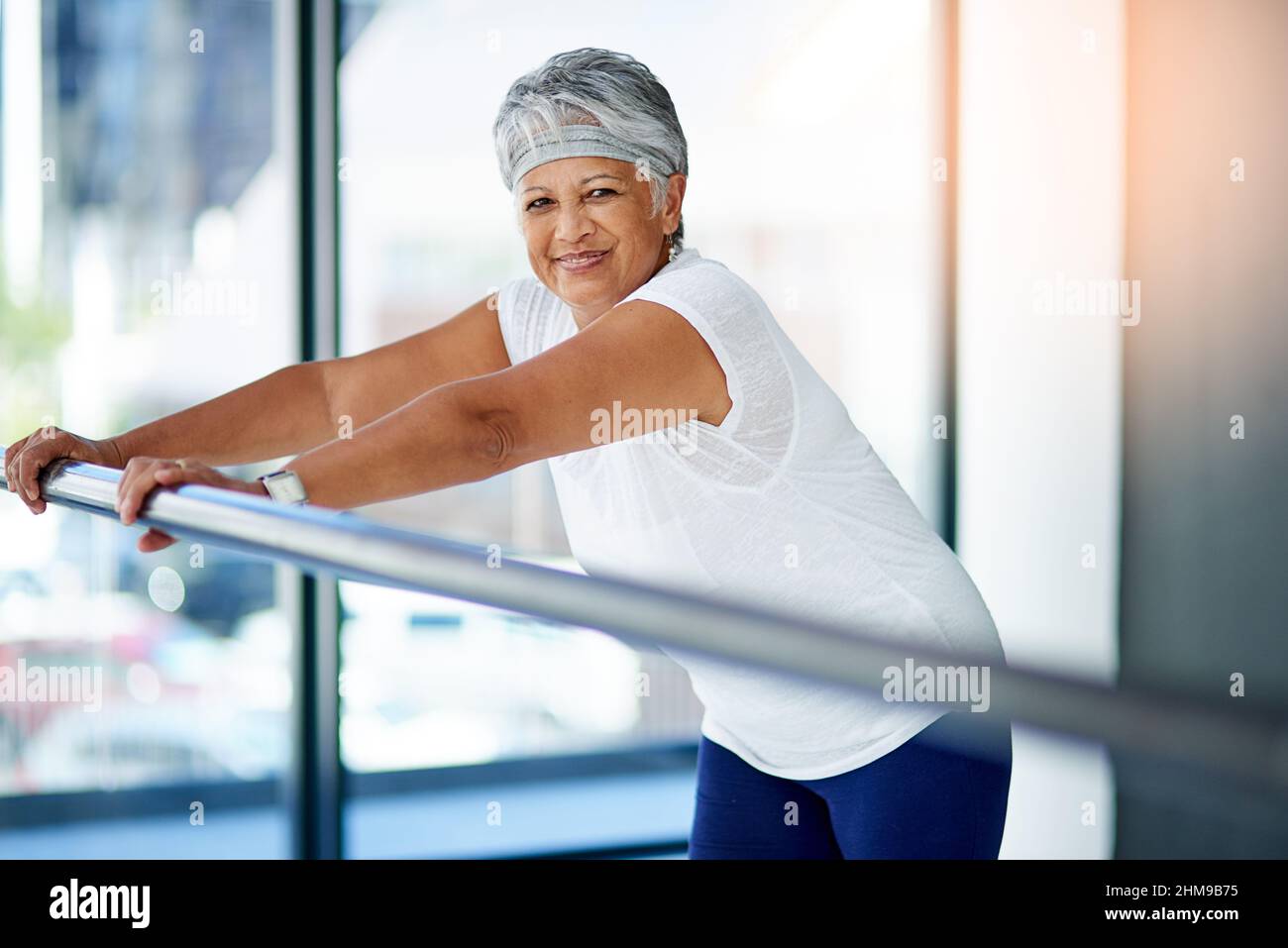 Fit is a fiddle. Shot of a senior woman working out indoors Stock Photo - Alamy