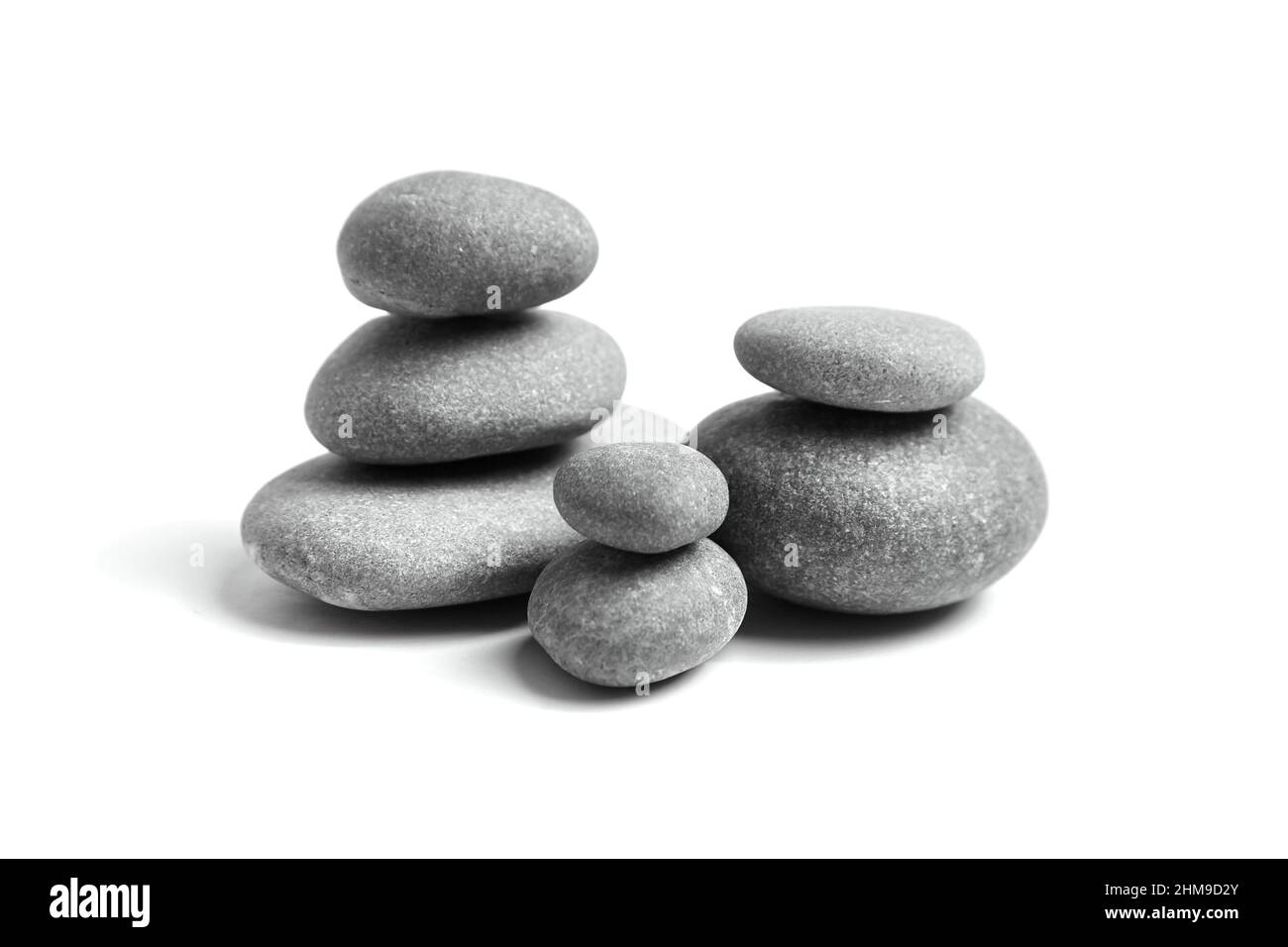 Stacked pebbles isolated on white background. Group of smooth grey ...