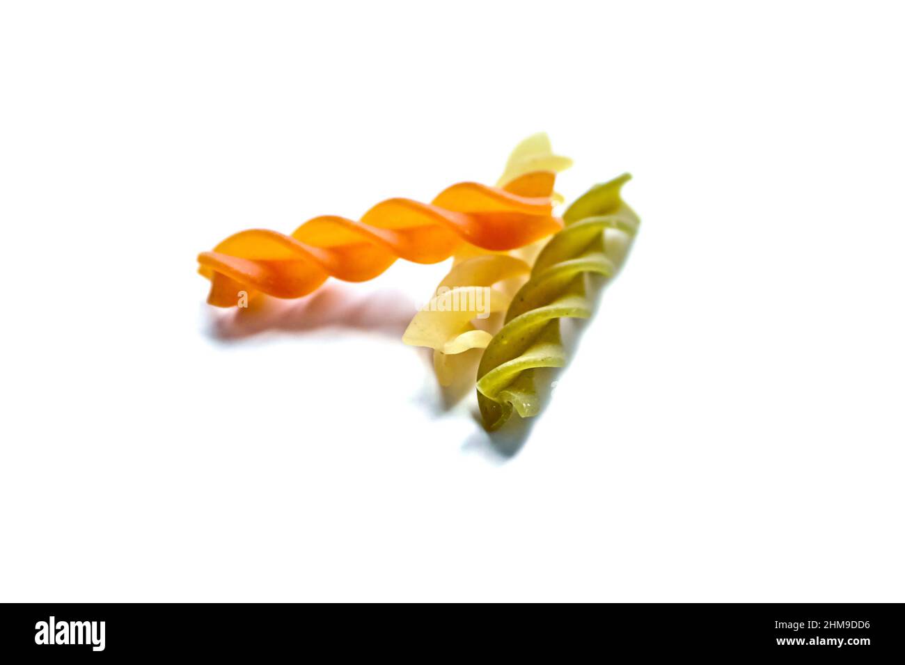 Italian pasta Fusilli tricolore isolated on a white background Stock ...
