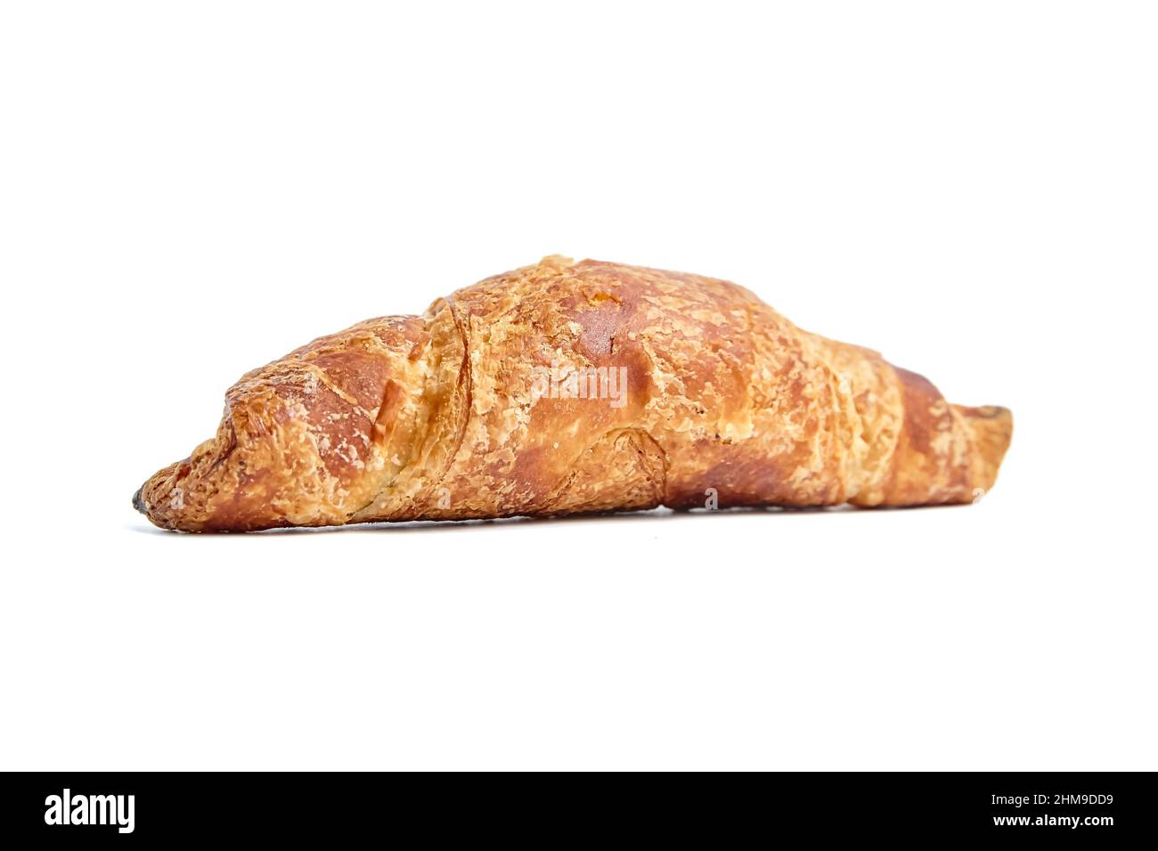 Single croissant isolated on white background. Flour baking Stock Photo ...