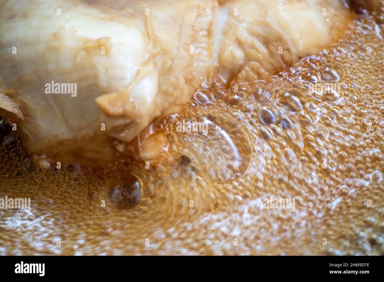 Deep frying chicken boiling hi-res stock photography and images - Alamy