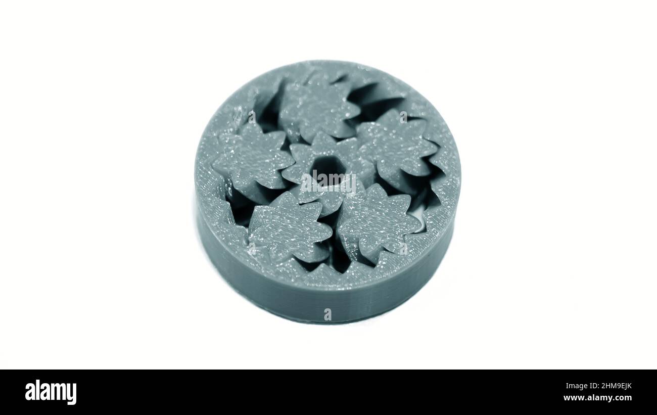 Abstract object of a blue color printed by 3d printer on white ...