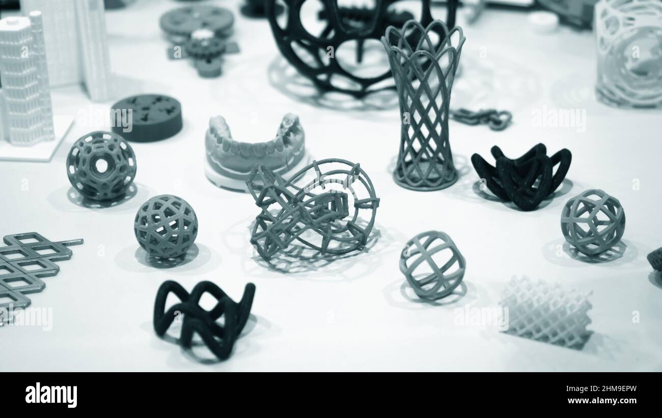 Many abstract models bright colorful objects printed on a 3d printer ...