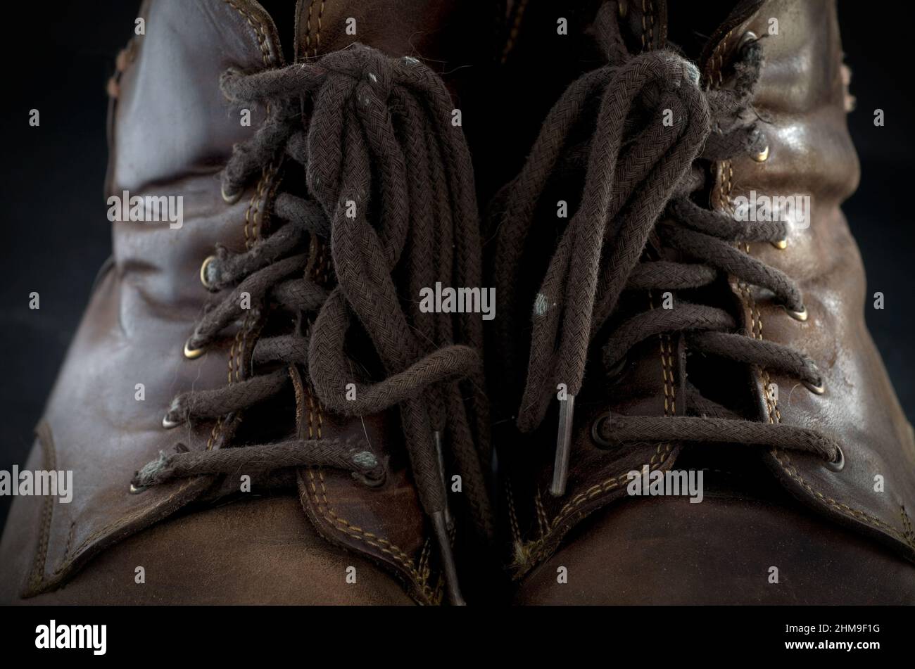 Front View of Old Dusty Leather Boots Horizontal Stock Photo - Alamy