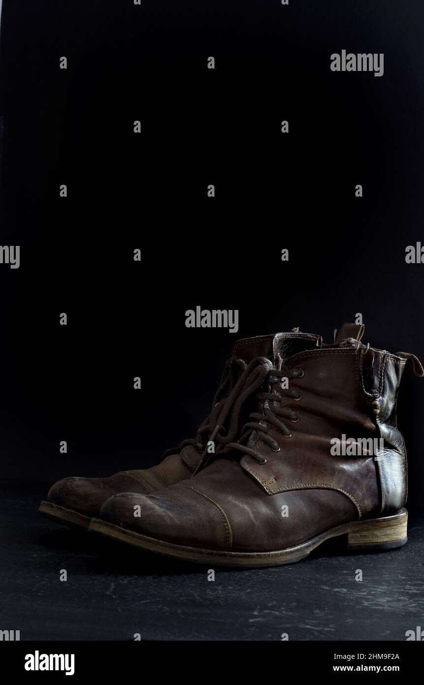 Old worn leather military boots hi-res stock photography and images - Alamy