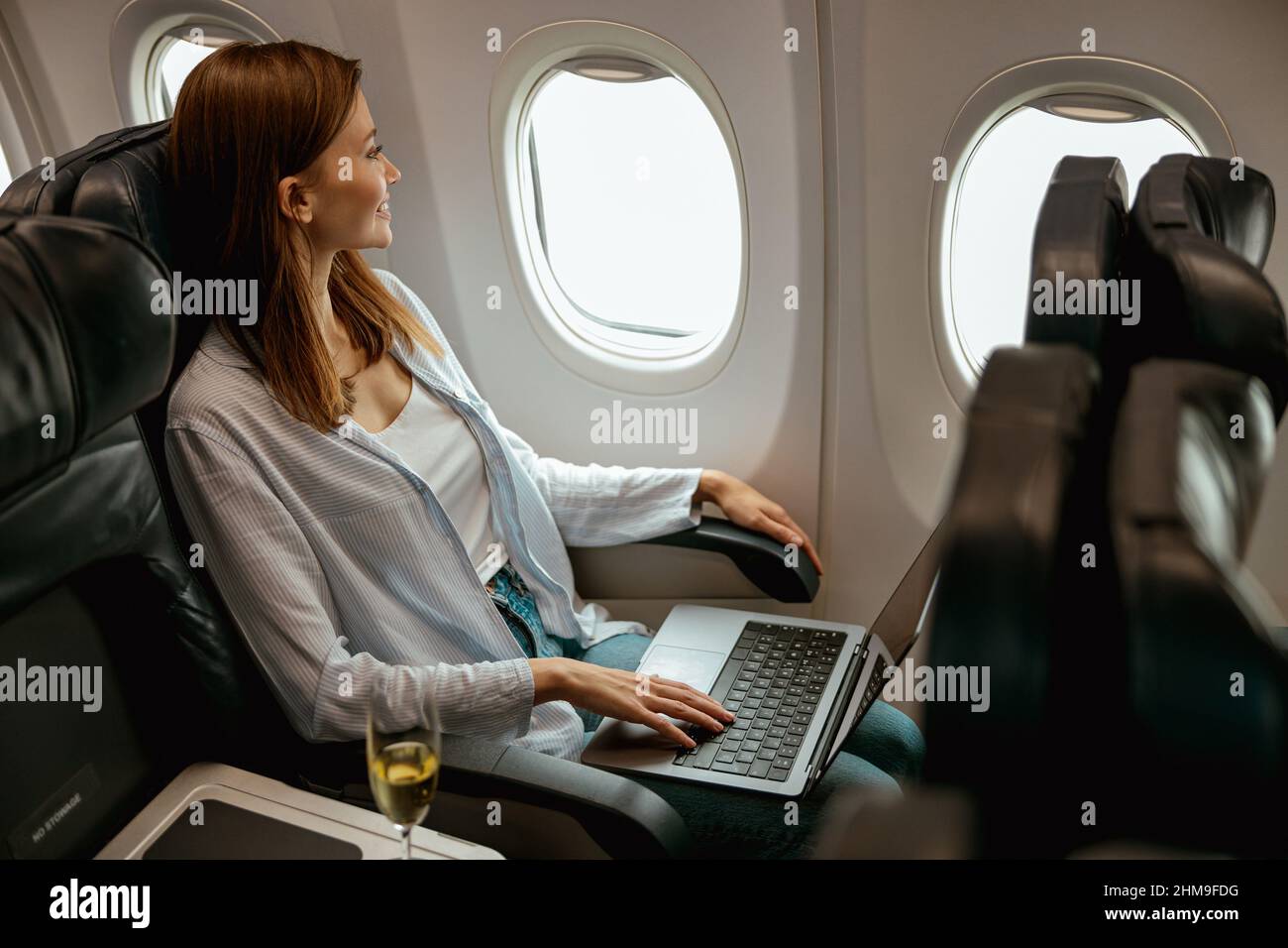 Laptop airplane hi-res stock photography and images - Alamy